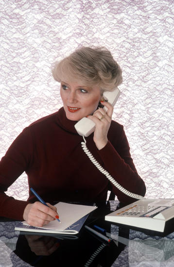 Model Released Woman Sitting Desk Using Editorial Stock Photo Stock