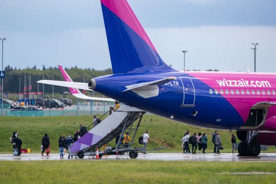 Passengers Leaving Plane After Arriving On Editorial Stock Photo ...