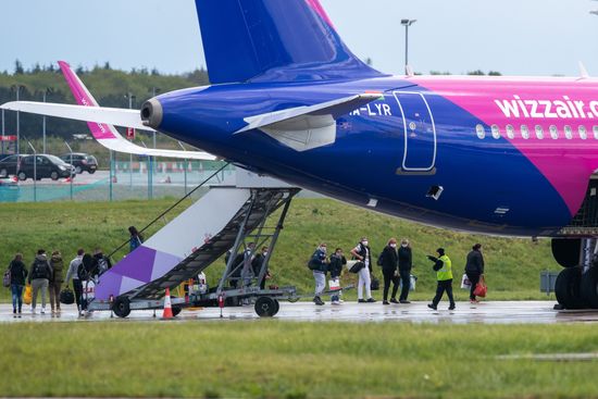 Passengers Leaving Plane After Arriving On Editorial Stock Photo ...