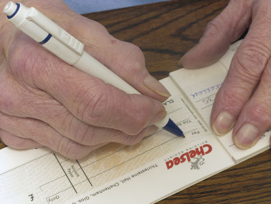 Elderly Woman Writing Cheque Editorial Stock Photo - Stock Image ...