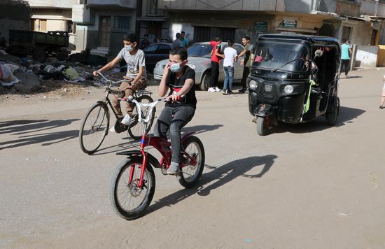 Egyptian Boy Rides Bicycle During Muslim Editorial Stock Photo - Stock ...