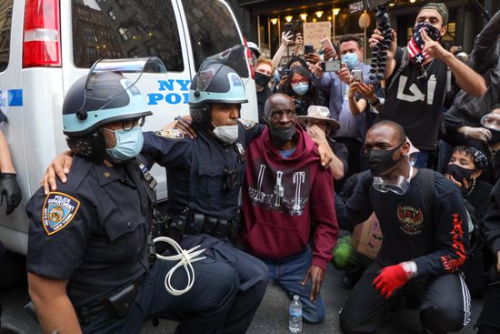Police Officers Kneeling Beside Black Man Editorial Stock Photo - Stock ...