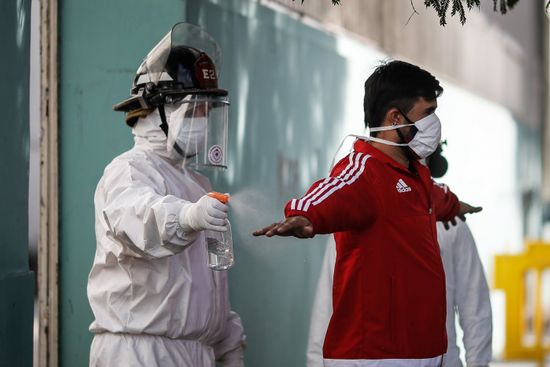 Firefighter Sprays Alcohol On Man During Editorial Stock Photo - Stock ...