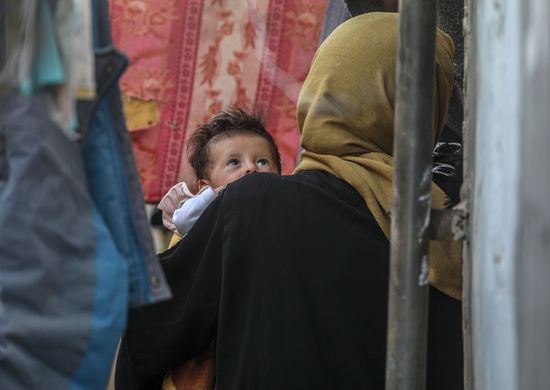 Refugee Baby Carried By His Mother Editorial Stock Photo - Stock Image ...