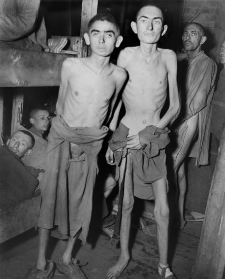 Men Suffering Starvation Standing By Bunks Editorial Stock Photo ...