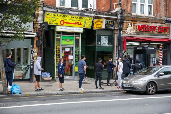 Customers Queue Outside Messy Cut Barbers Editorial Stock Photo - Stock ...