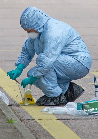 Forensic Officer Removing Evidence What Looks Editorial Stock Photo ...