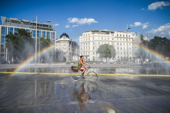 Cyclist Passes Water Spray On Schwarzenbergplatz Editorial Stock Photo ...