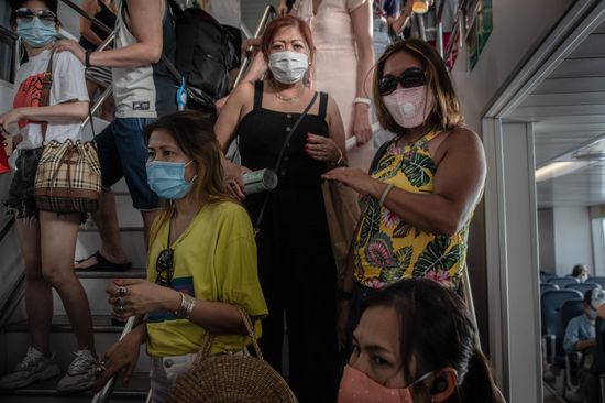 Passengers On Ferry Wear Surgical Masks Editorial Stock Photo - Stock ...