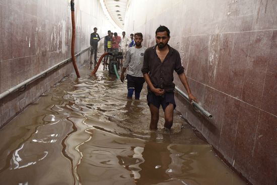 People Wade Across Waterlogged Pedestrian Subway Editorial Stock Photo ...