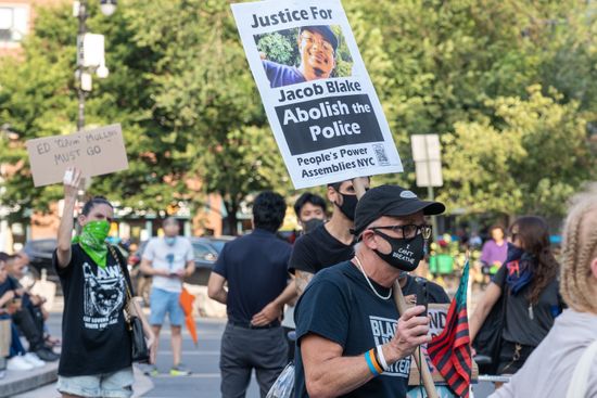 Protester Wearing Face Mask Holds Placard Editorial Stock Photo - Stock ...