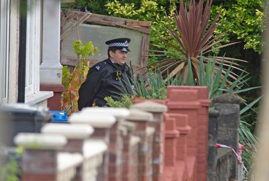 Police Officer Stands Guard Front Door Editorial Stock Photo - Stock ...