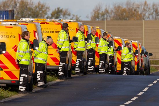 Aa Workers Standing By Their Vans Editorial Stock Photo - Stock Image ...