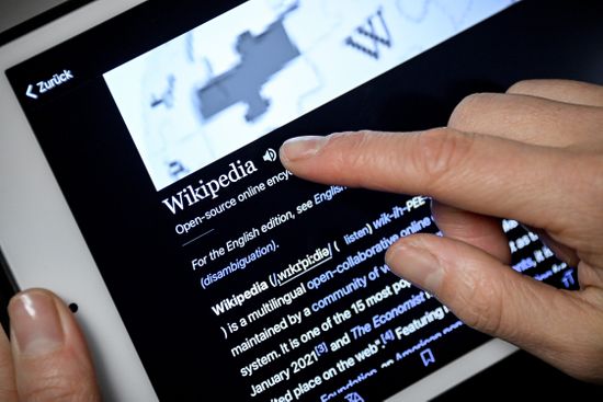 Closeup Image Shows Woman Using Wikipedia Editorial Stock Photo - Stock ...