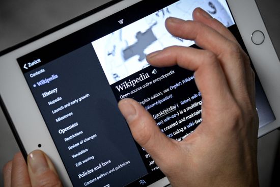 Closeup Image Shows Woman Using Wikipedia Editorial Stock Photo - Stock ...