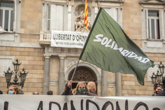 Protester Waving Flag That Says Solidarity Editorial Stock Photo ...