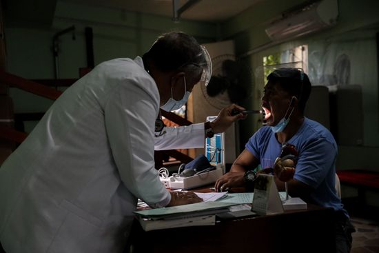 Jaime Roa Uses Flashlight Check On Editorial Stock Photo - Stock Image ...