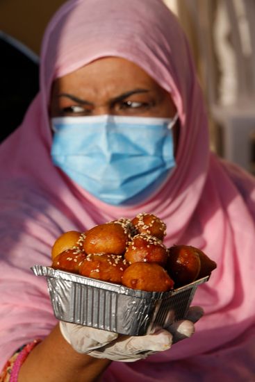 Woman Presents Traditional Emirati Pastry On Editorial Stock Photo ...