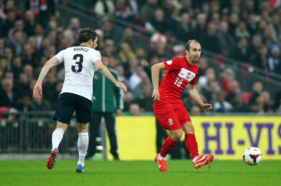 Polands Adrian Mierzejewski Englands Leighton Baines Editorial Stock ...