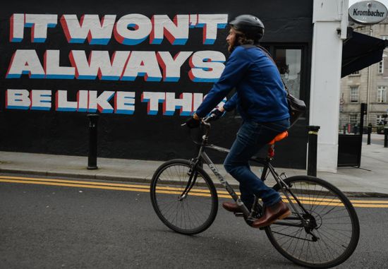 Man Cycles Past Mural By Irish Editorial Stock Photo - Stock Image ...
