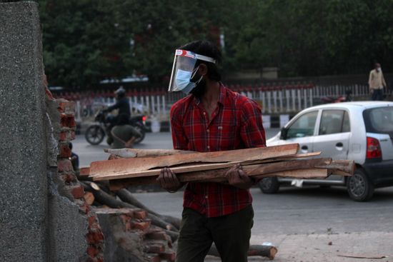 Boy Carries Wood Pyre During Cremation Editorial Stock Photo - Stock ...