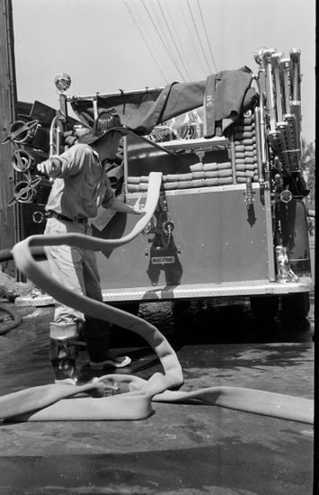 Man Pulling Fire Hose During Utica Editorial Stock Photo - Stock Image ...