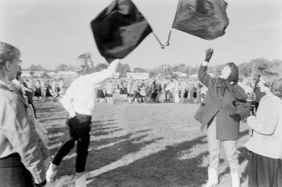 Two Women Throwing Flags During Event Editorial Stock Photo - Stock ...