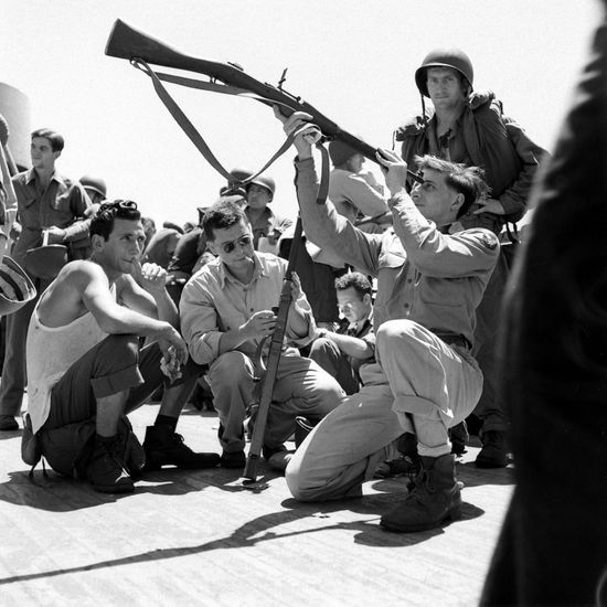 Soldiers Holding Rifles On Ship During Editorial Stock Photo - Stock ...