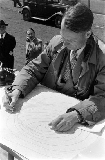 Man Plotting On Piece Paper During Editorial Stock Photo - Stock Image ...