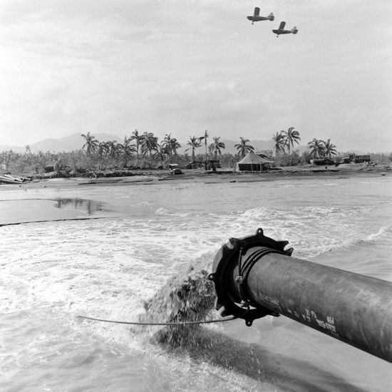 Water Pipe Spitting Water Into Sea Editorial Stock Photo - Stock Image ...