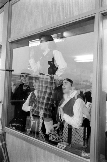 People Gathering Near Window Glass During Editorial Stock Photo - Stock ...