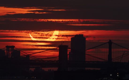 Partial Solar Eclipse Rises Over Bridges Editorial Stock Photo - Stock ...