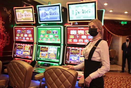Employee Face Mask Stands Front Slot Editorial Stock Photo - Stock ...