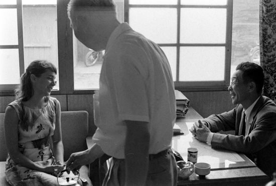 American Exchange Student Conversing Men During Editorial Stock Photo ...
