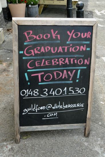 Book Your Graduation Celebration Sign Outside Editorial Stock Photo ...
