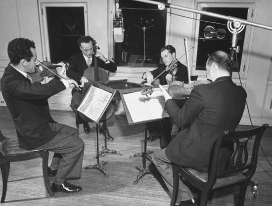 Group Four People Playing String Instruments Editorial Stock Photo ...