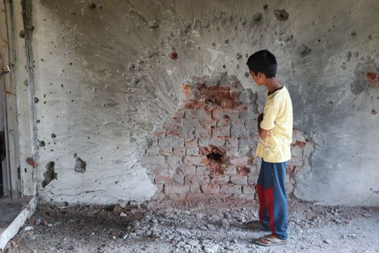 Young Boy Looking Towards Wall Damaged Editorial Stock Photo - Stock ...
