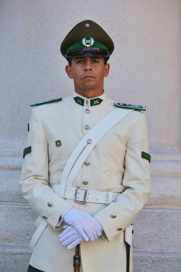 Uniformed Guard Outside Palacio De La Editorial Stock Photo - Stock ...