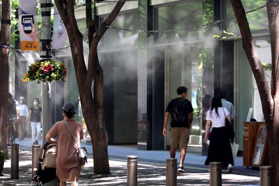 Pedestrians Get Water Mist Shower Cool Editorial Stock Photo - Stock ... Pedestrians Get Water Mist Shower Cool Editorial Stock Photo - Stock ...