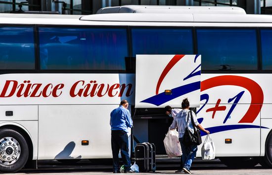 Passengers Load Their Luggage Into Bus Editorial Stock Photo - Stock ...