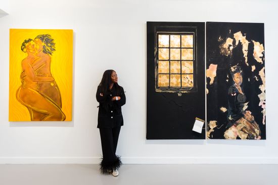 Curator Adora Mba Stands Between Artworks Editorial Stock Photo - Stock ...