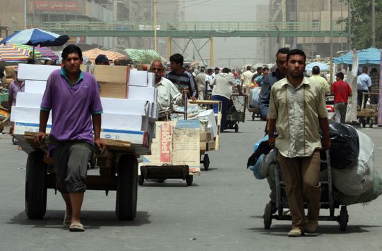 Iraqi Porters Pull Goods On Carts Editorial Stock Photo - Stock Image ...