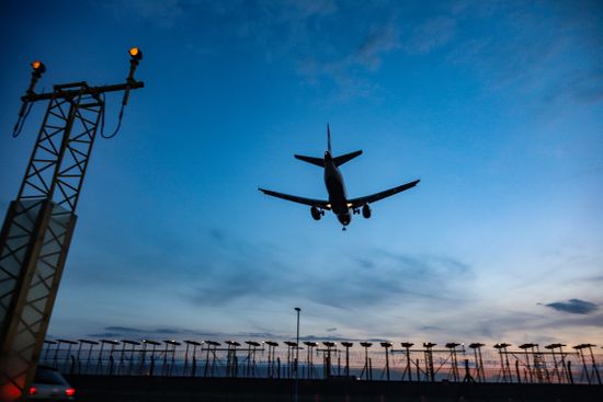 Airplane Silhouettes While On Final Approach Editorial Stock Photo ...