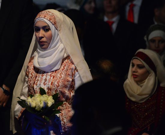 Palestinian Bride Holds Flowers During Mass Editorial Stock Photo ...