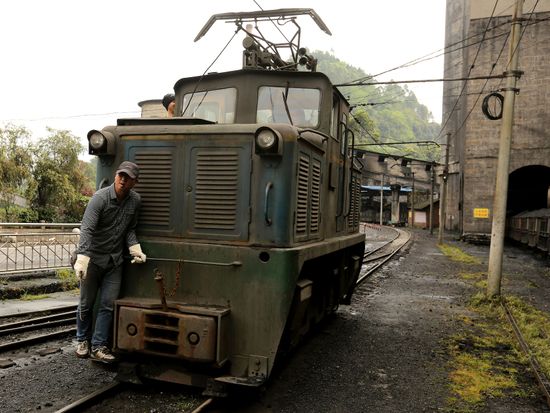 Chinese Rail Worker Rides On Coal Editorial Stock Photo - Stock Image ...