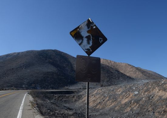 Burned Road Sign Greets Empty Road Editorial Stock Photo - Stock Image ...