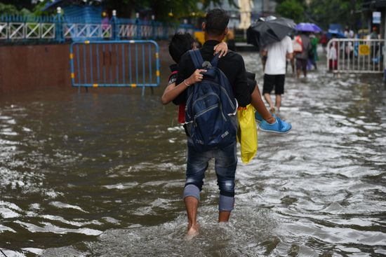 People Wade Through Water Logged Entrance Editorial Stock Photo - Stock ...