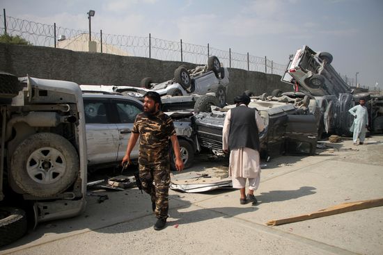 Taliban Members Walk Past Damaged Vehicles Editorial Stock Photo ...