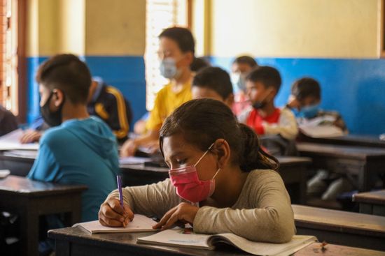 Primary Level Student Writes On Her Editorial Stock Photo - Stock Image ...