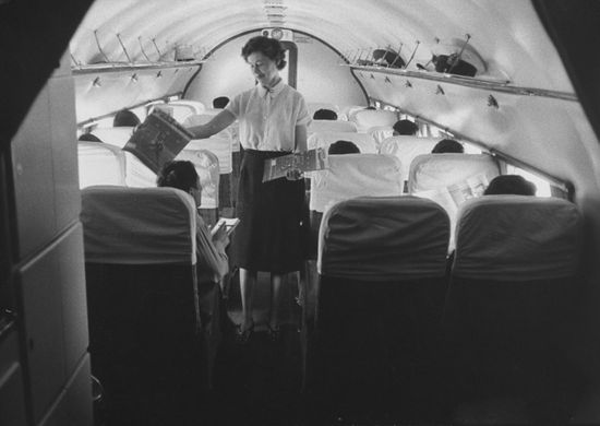 Stewardess Handing Out Magazines Passengers Aboard Editorial Stock ...